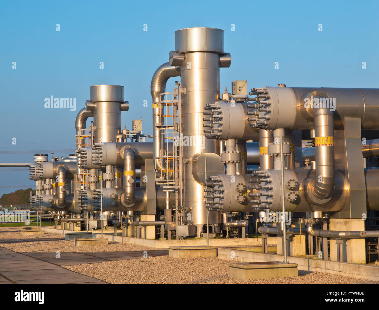 natural gas processing site during sunset Stock Photo - Alamy