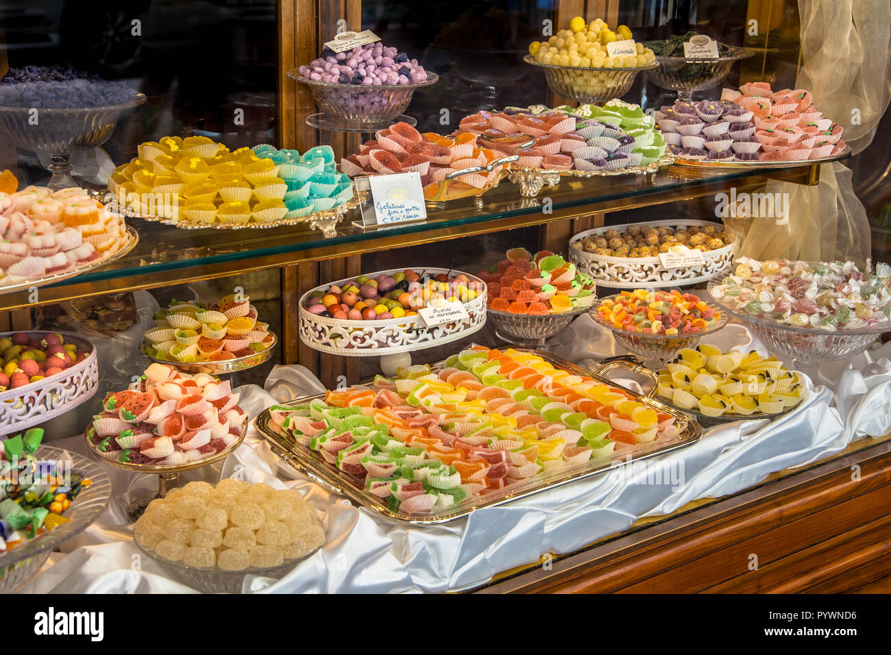 Italian traditional Pastry shop glass display with selection of ...
