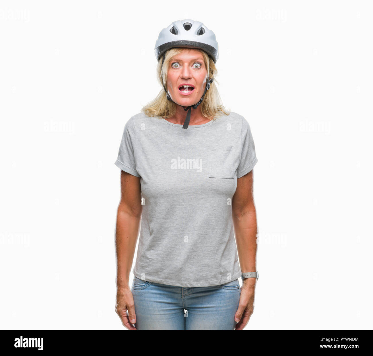 Middle age caucasian cyclist woman wearing safety helmet over isolated ...