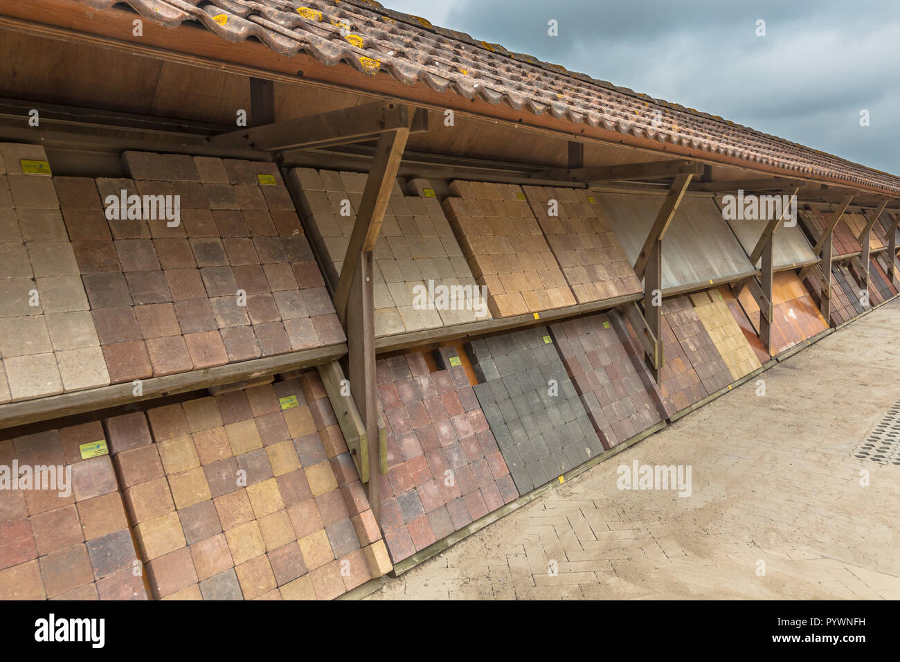 Display of fancy paving stones and road bricks at a stoneyard shop ...