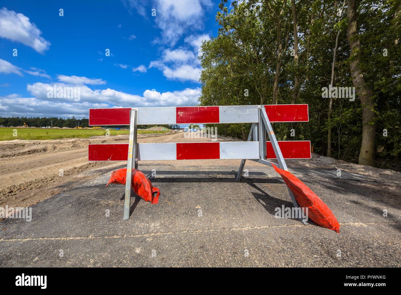 Red and white no entry roadblock on a small asphalt country road Stock ...