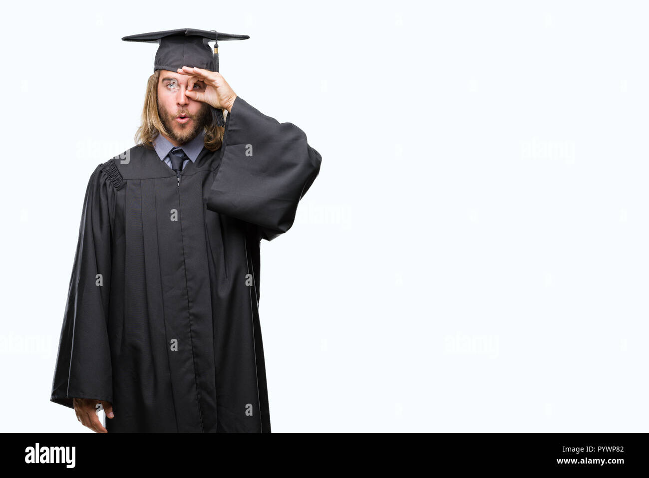 Young handsome graduated man with long hair over isolated background ...