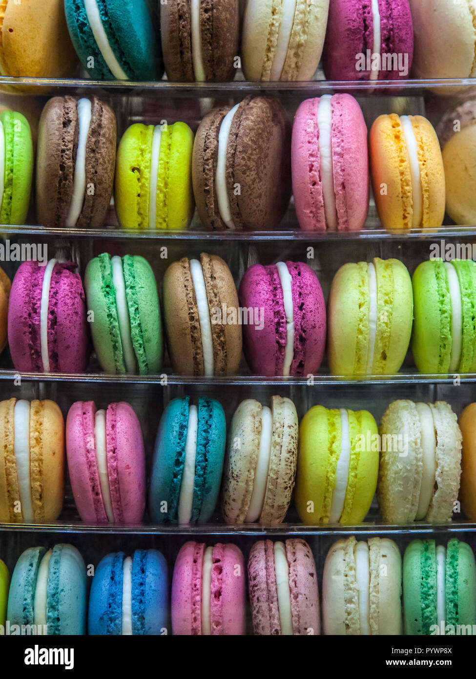 Colorful Macaron Cookies on Display in many variaties in a pastry shop ...