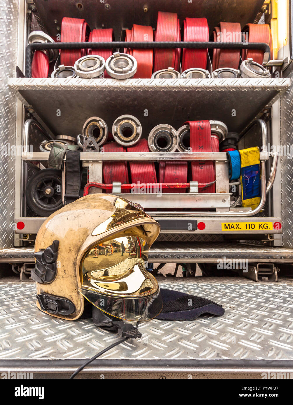 Modern Golden Fire Brigade Helmet and Other Inventory of a Fire Engine ...
