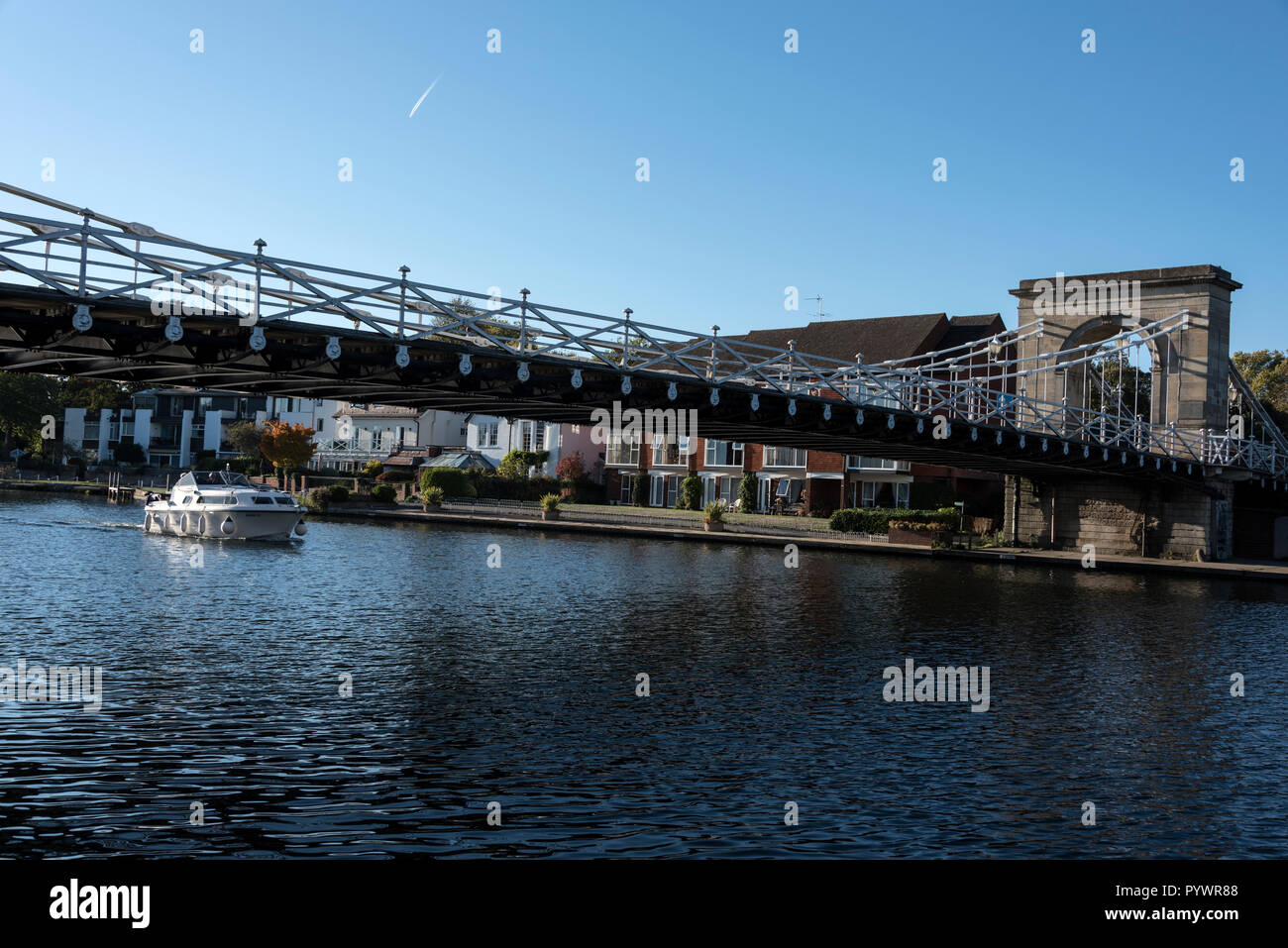 A river cruiser approaching the suspension bridge at Marlow in ...