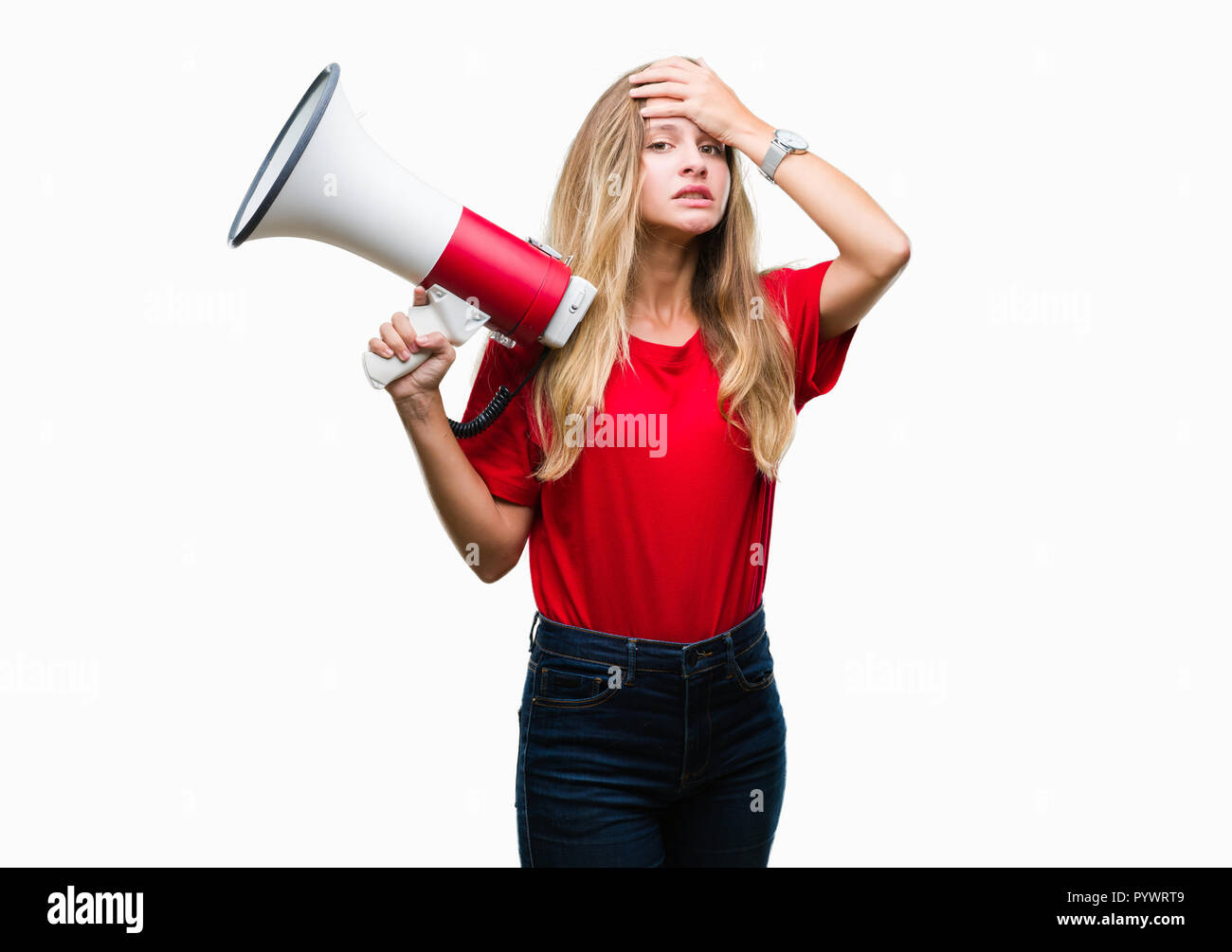Young beautiful blonde woman yelling through megaphone over isolated ...