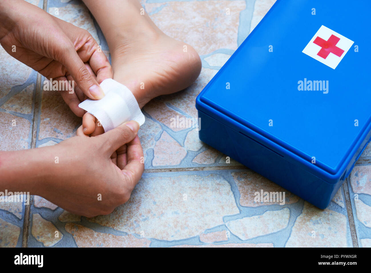 First aid bandage child mother hi-res stock photography and images - Alamy