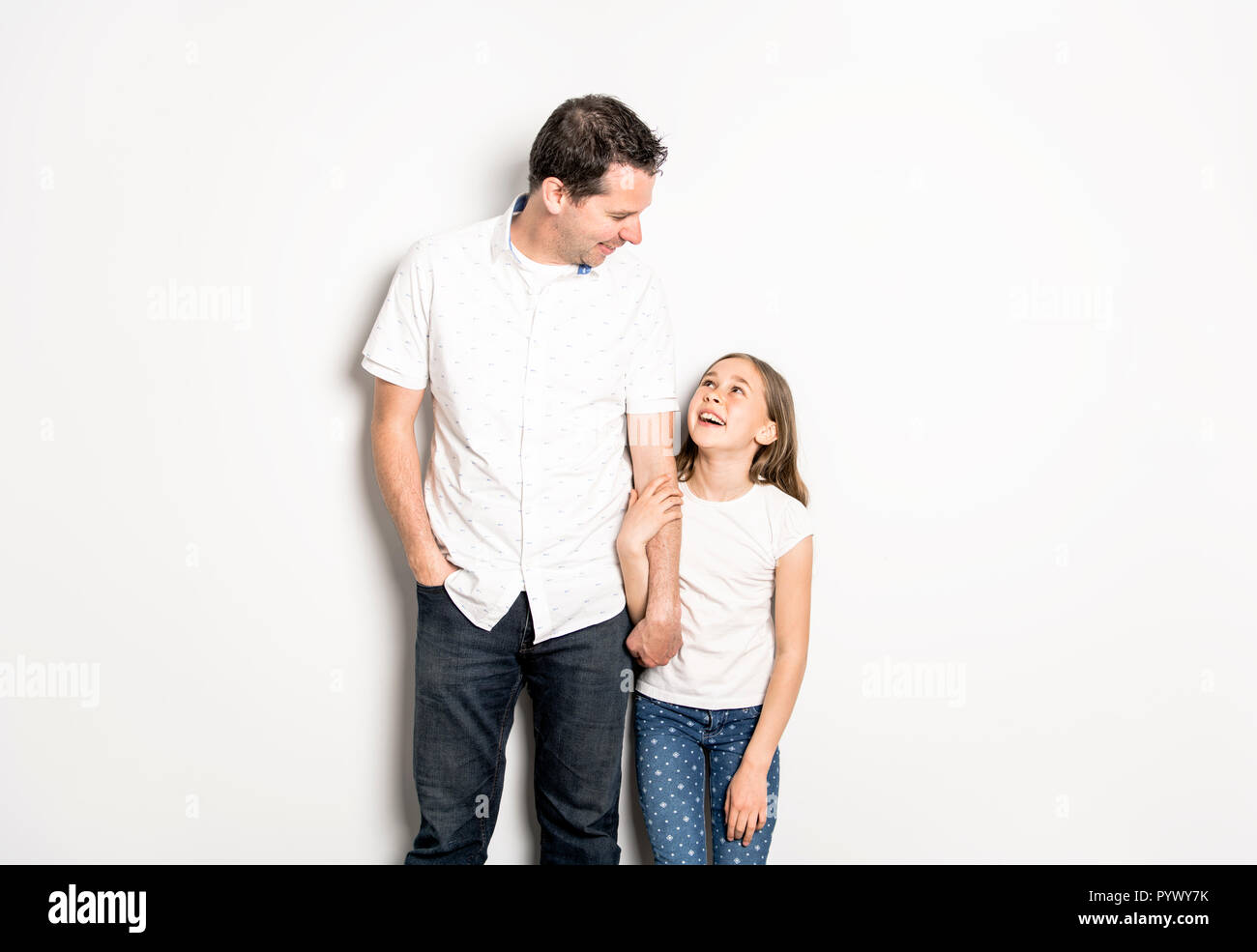 Girl with his father, isolated on white background Stock Photo - Alamy