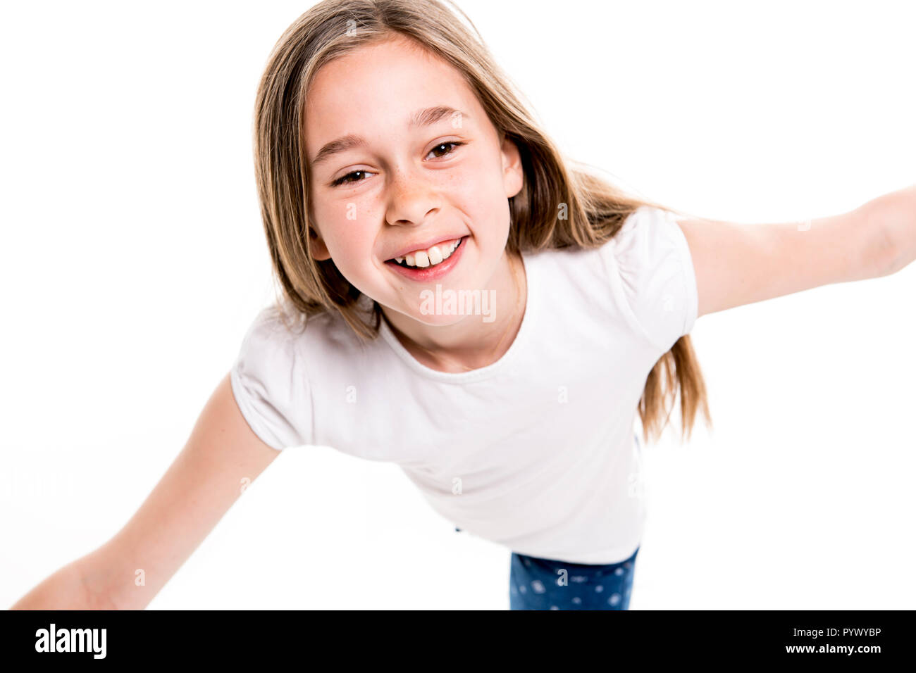 Portrait of cute, confident 9 years old girl, isolated on white Stock ...