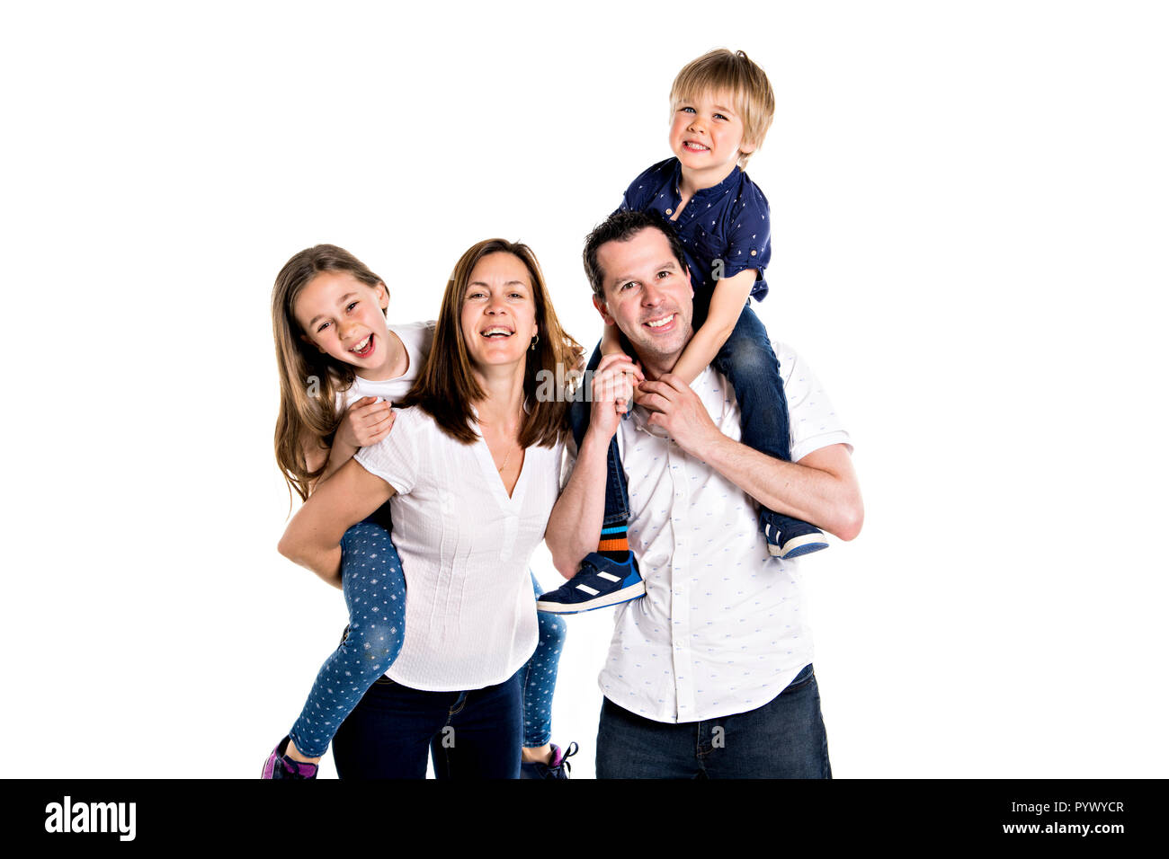 A Happy family with two kids on studio white background Stock Photo - Alamy