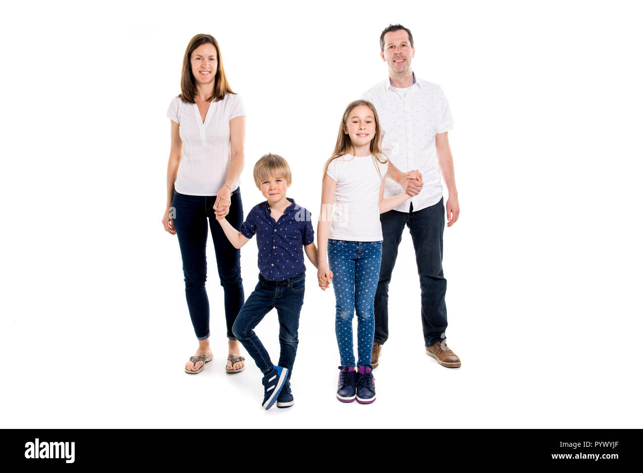 A Happy family with two kids on studio white background Stock Photo - Alamy