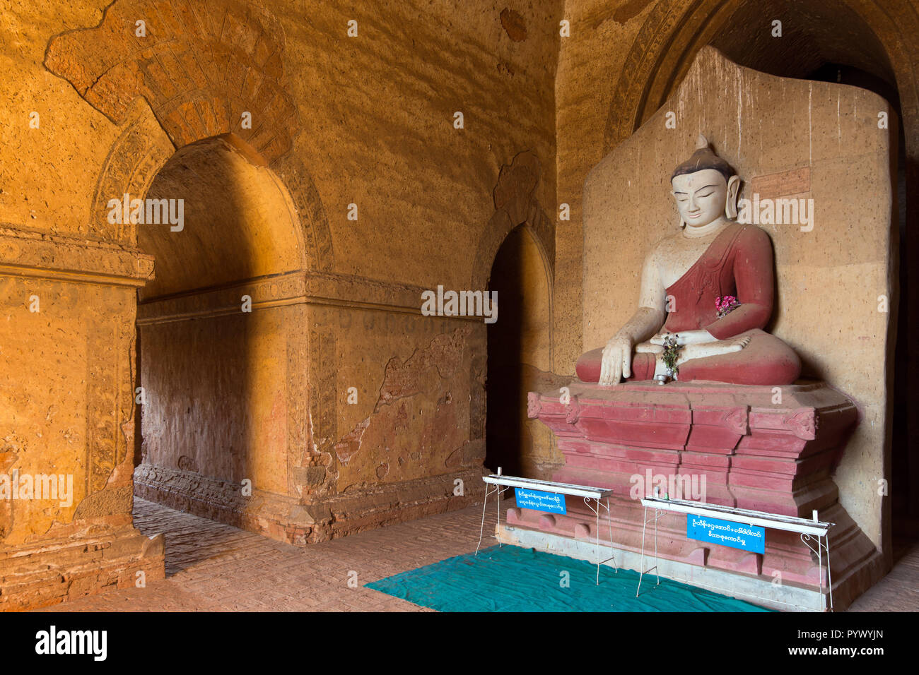 Red painted Buddha inside a pagoda, Bagan, Myanmar Stock Photo - Alamy