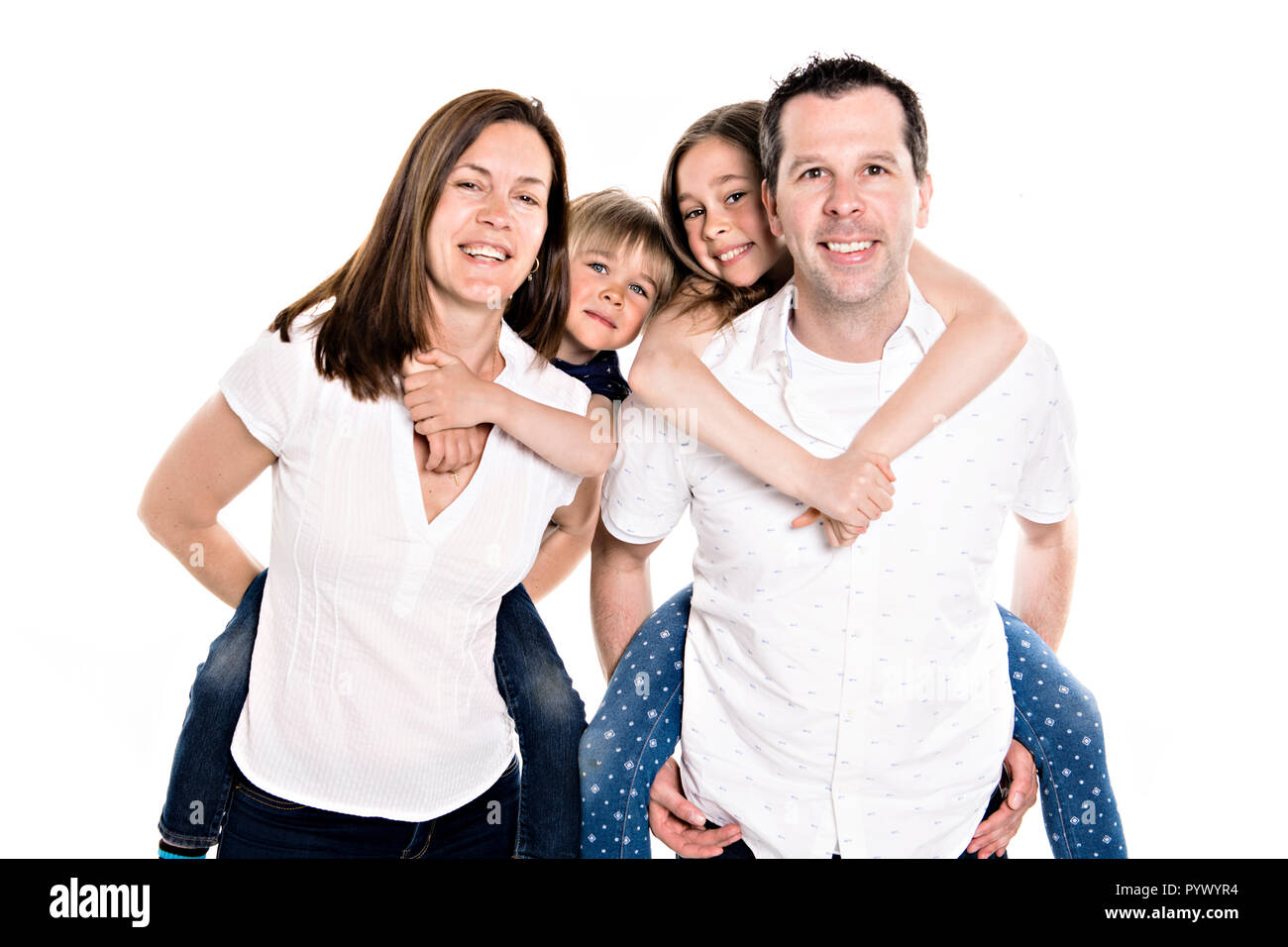 A Happy family with two kids on studio white background Stock Photo - Alamy