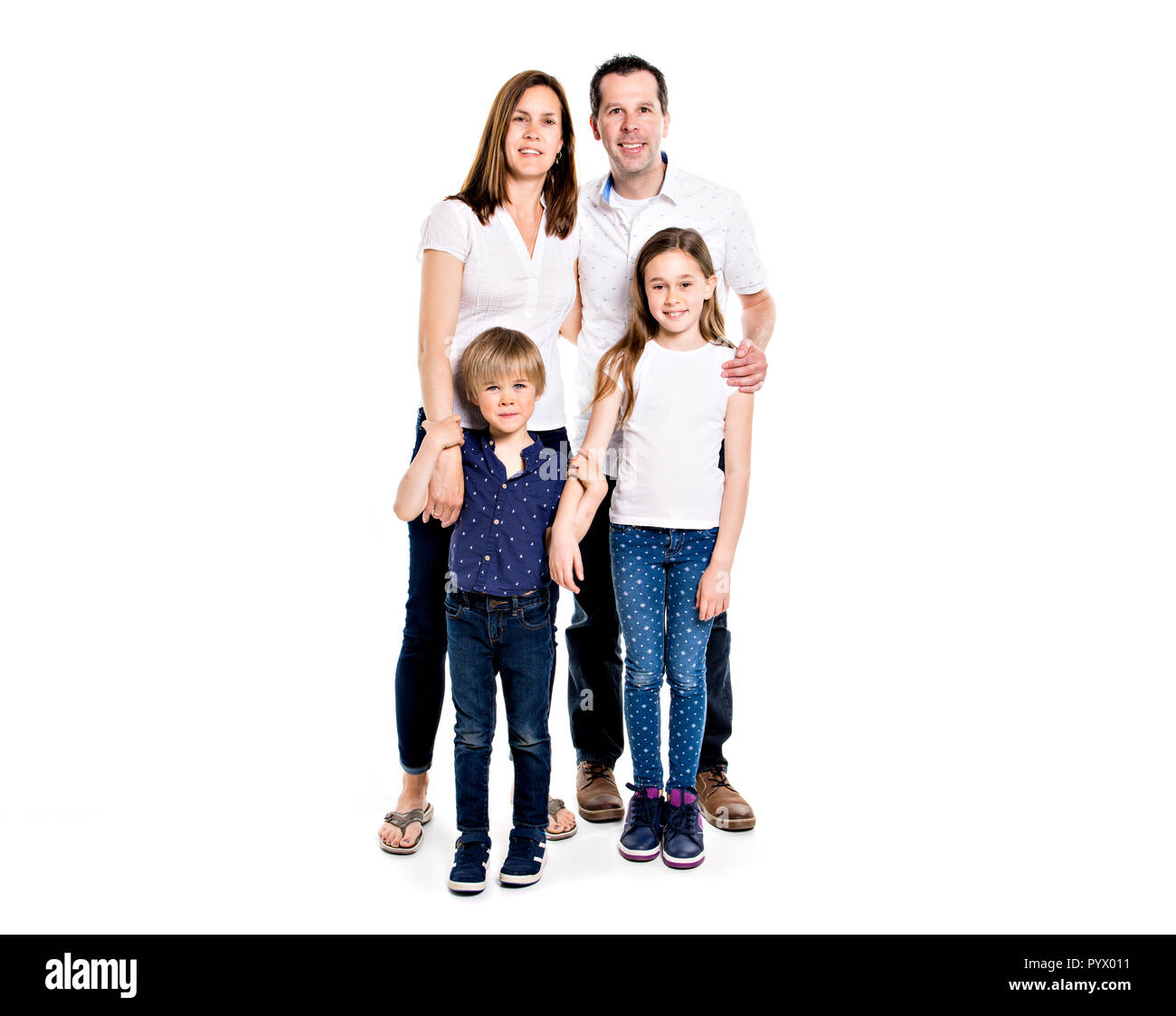 A Happy family with two kids on studio white background Stock Photo - Alamy