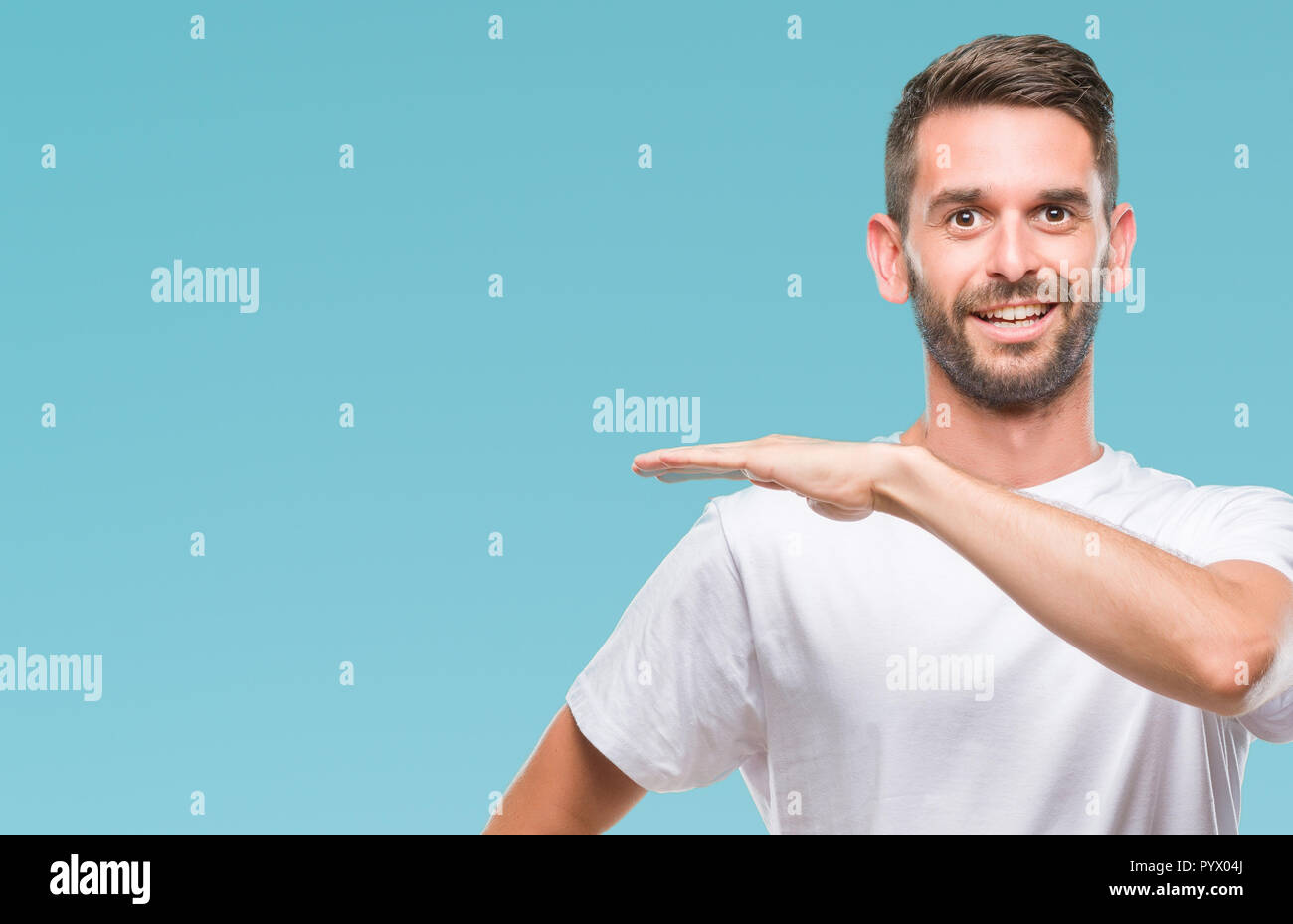 Young handsome man over isolated background gesturing with hands ...