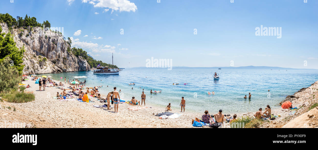MAKARSKA, CROATIA - JULY 19, 21018: Tourists relaxing at marvelous ...