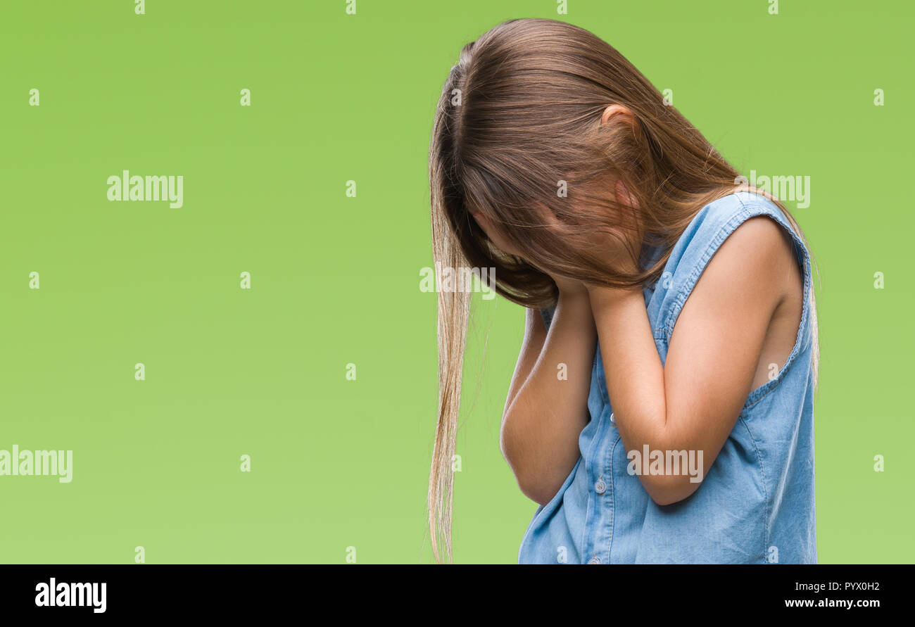 Young beautiful girl over isolated background with sad expression ...