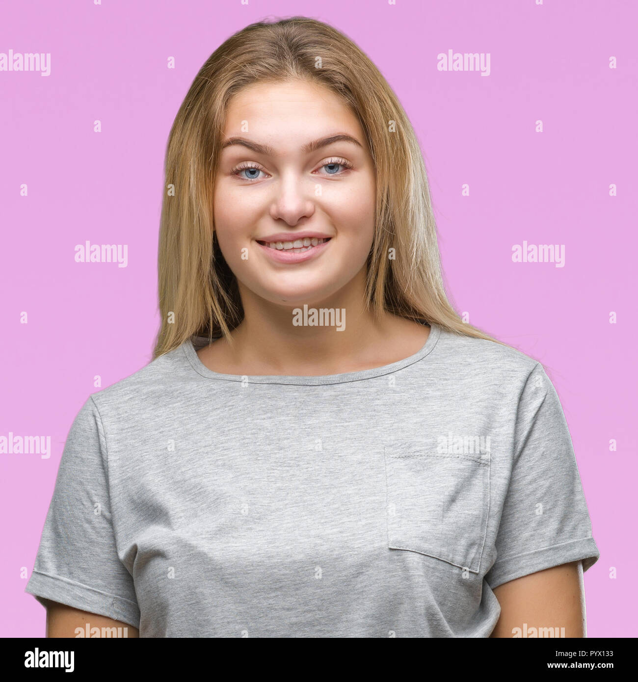 Young caucasian woman over isolated background with a happy and cool ...