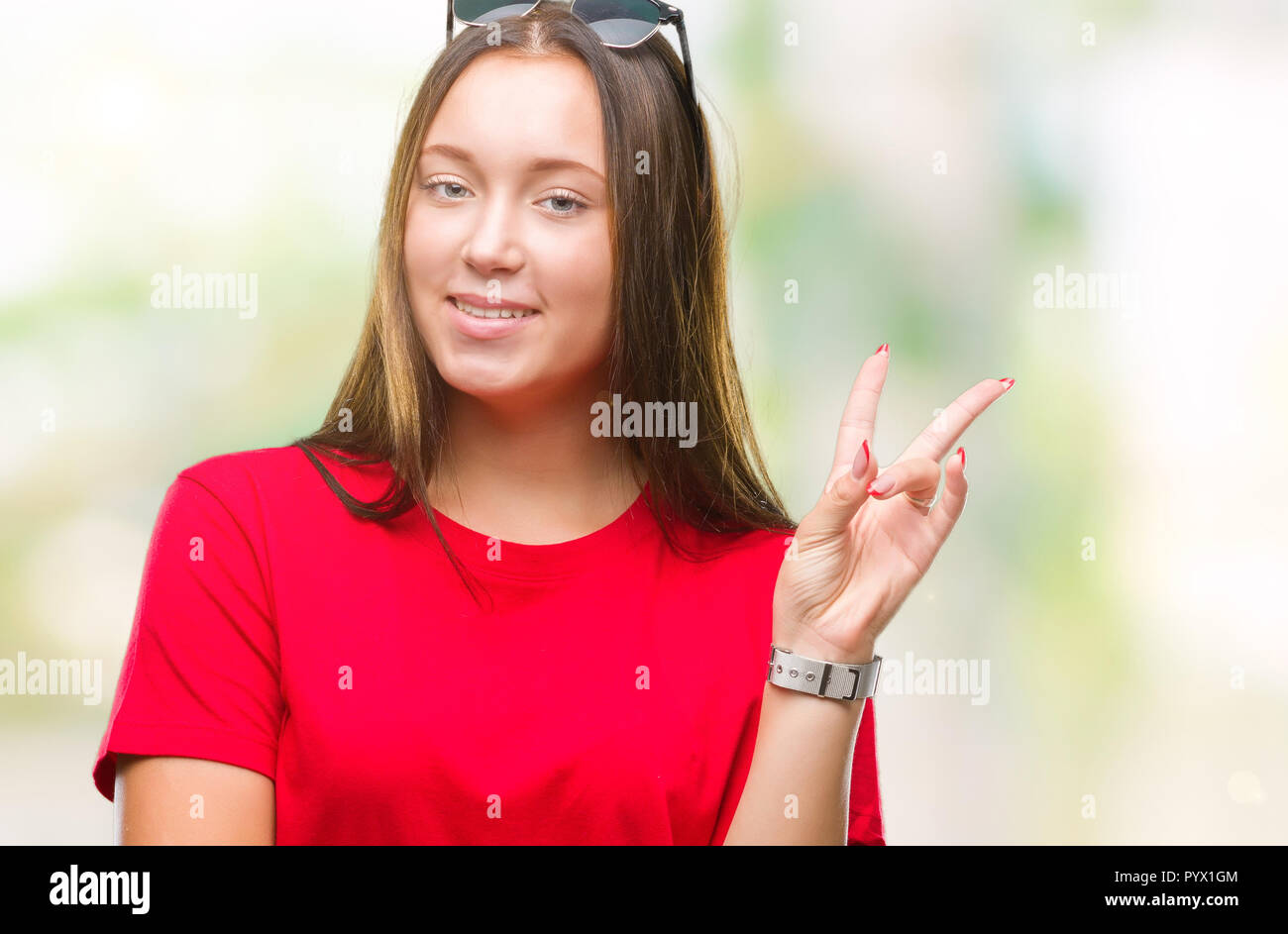 Young beautiful caucasian woman wearing sunglasses over isolated ...