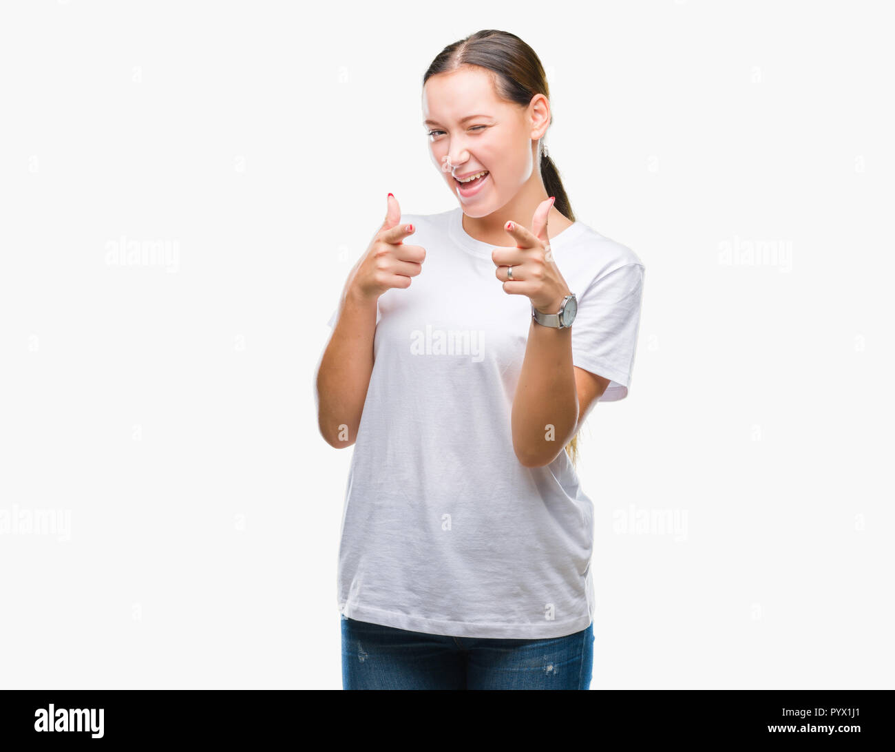Young beautiful caucasian woman over isolated background pointing ...