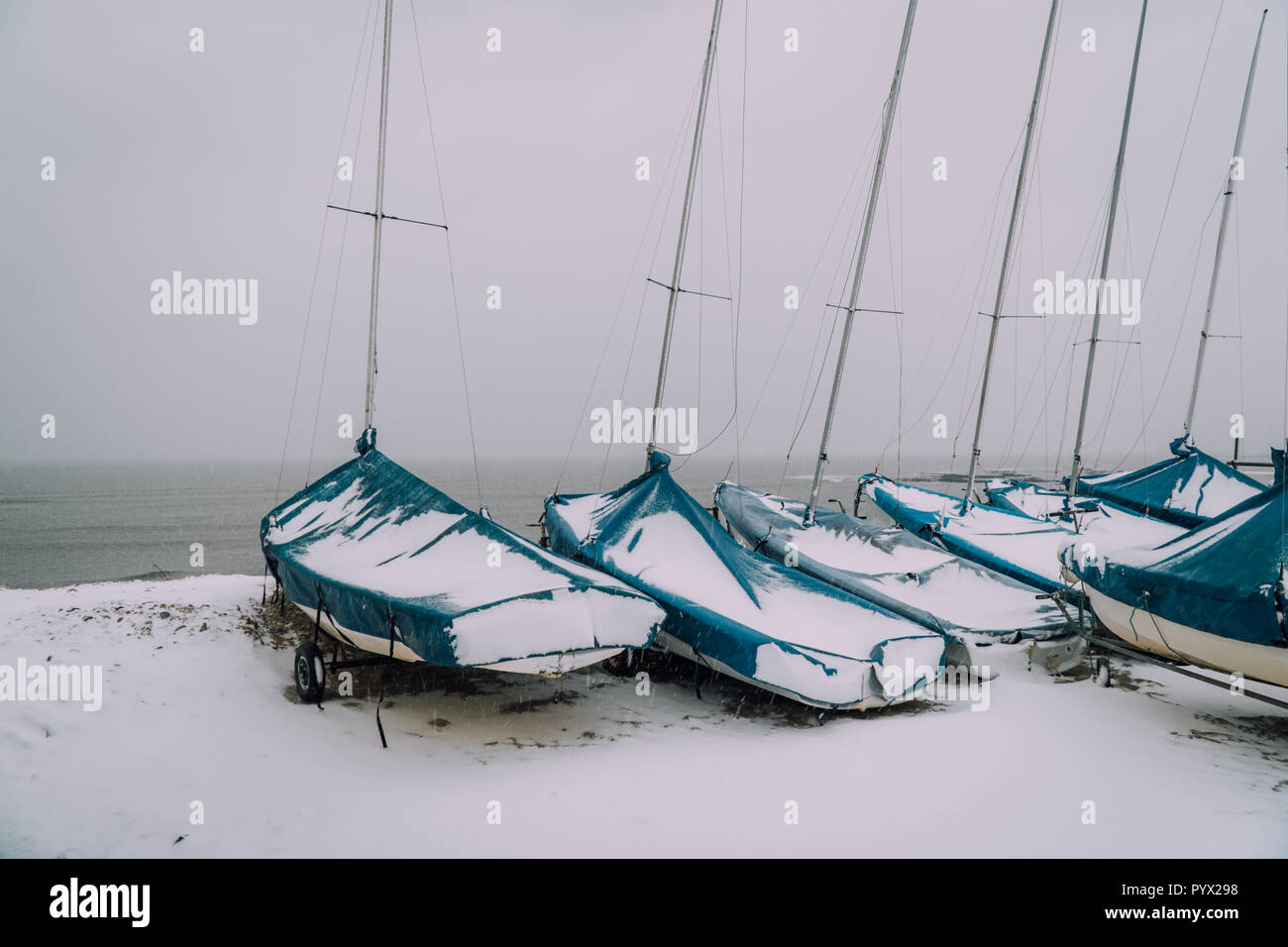 Boats Covered In Snow Stock Photo - Alamy
