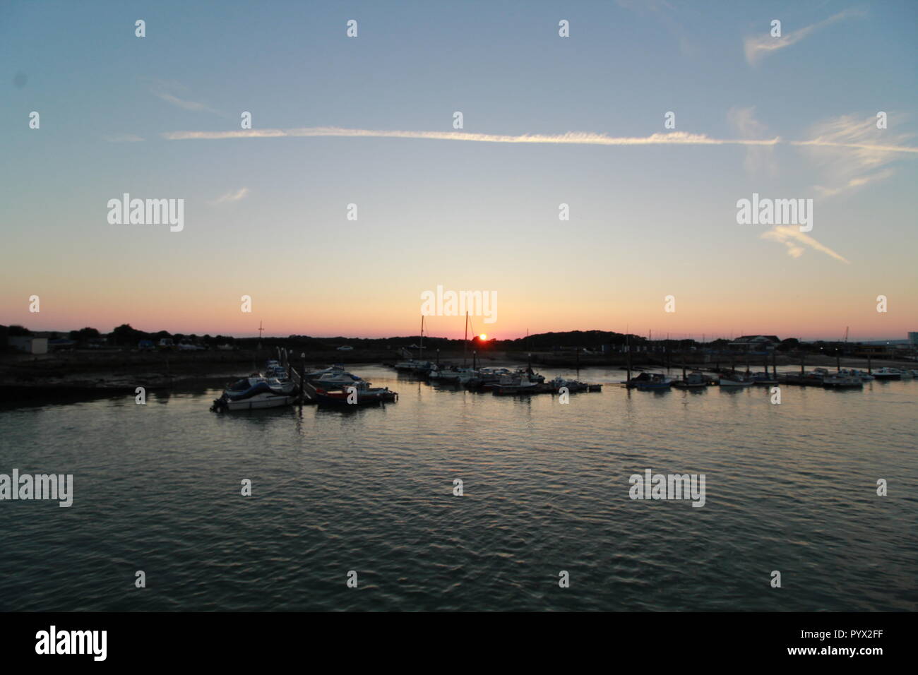 Littlehampton harbour at sunset Stock Photo - Alamy