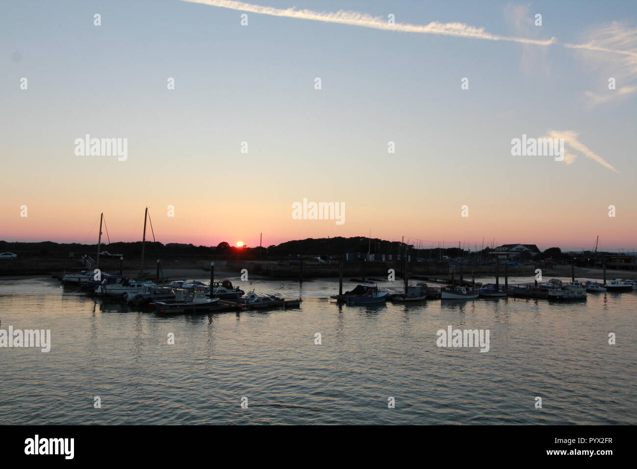 Littlehampton harbour at sunset Stock Photo - Alamy
