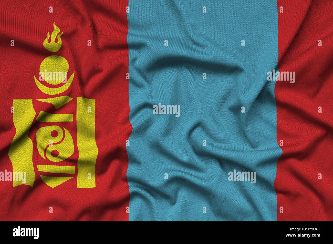 Mongolia flag is depicted on a sports cloth fabric with many folds ...