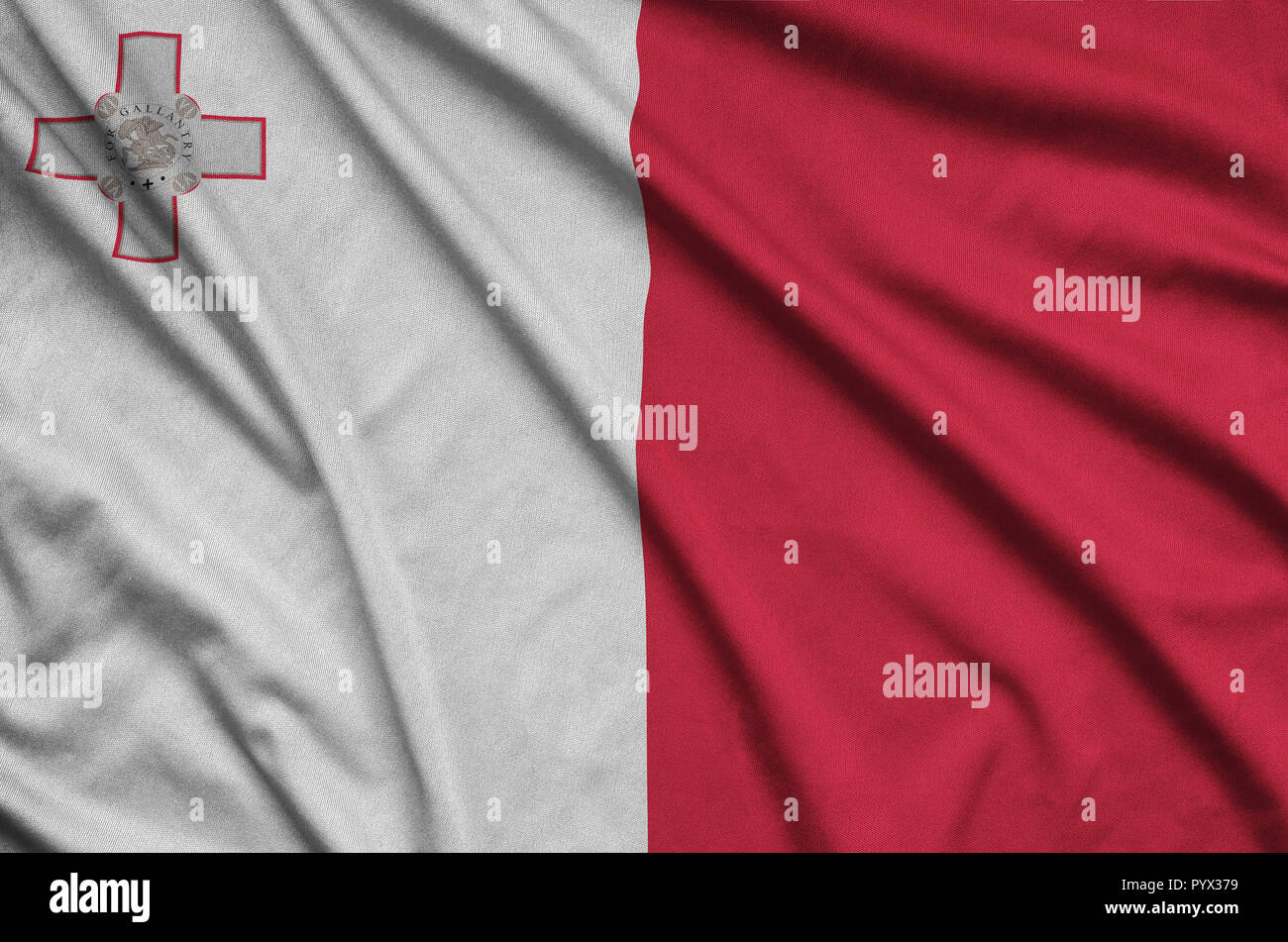 Malta flag is depicted on a sports cloth fabric with many folds. Sport ...