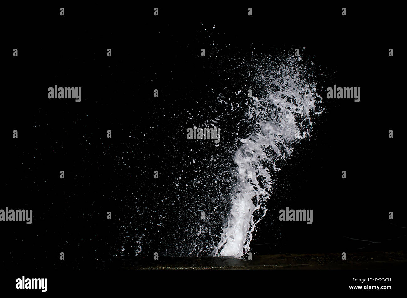 Splashing wave on the Black sea in the night Stock Photo - Alamy