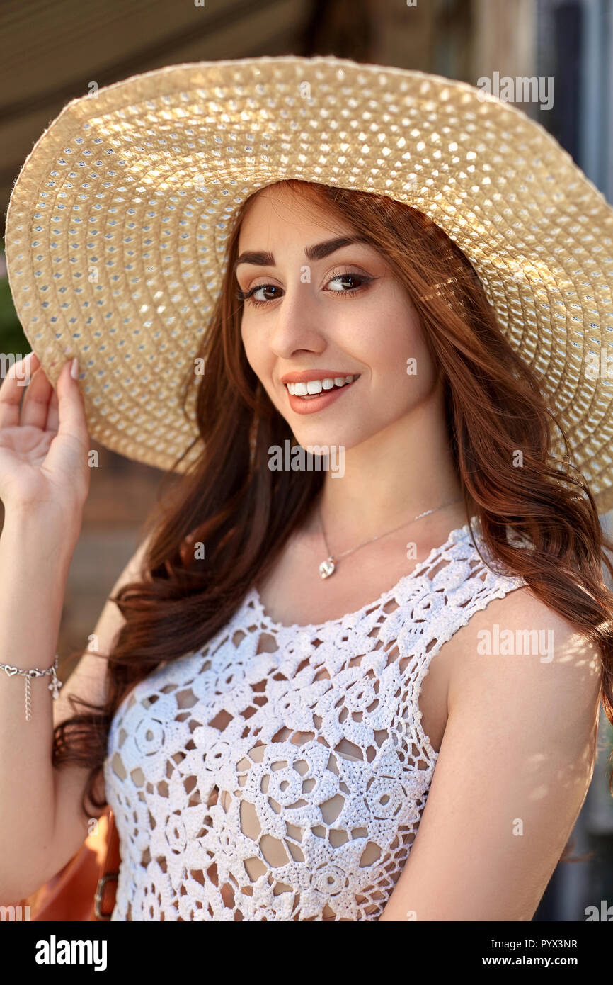 Fashion woman portrait of young pretty trendy girl posing at the city ...