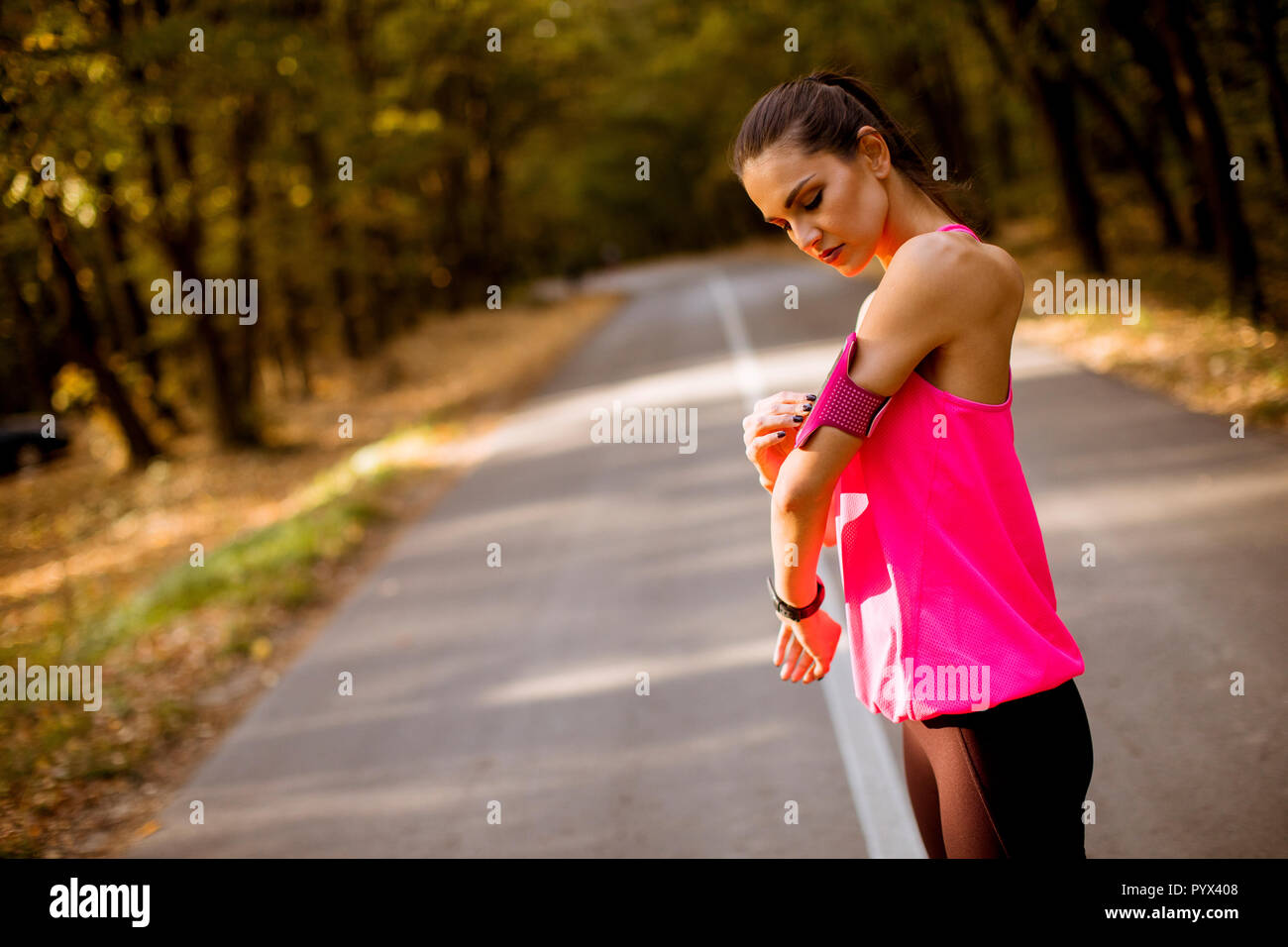 Female runner during outdoor workout in beautiful autumn mountain ...