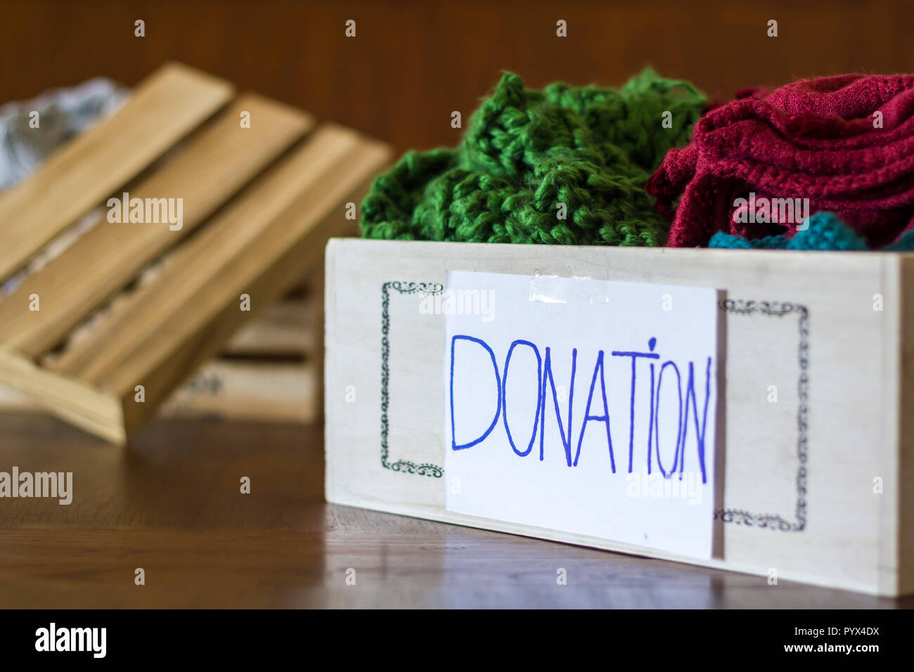 Donation box with clothes Stock Photo - Alamy