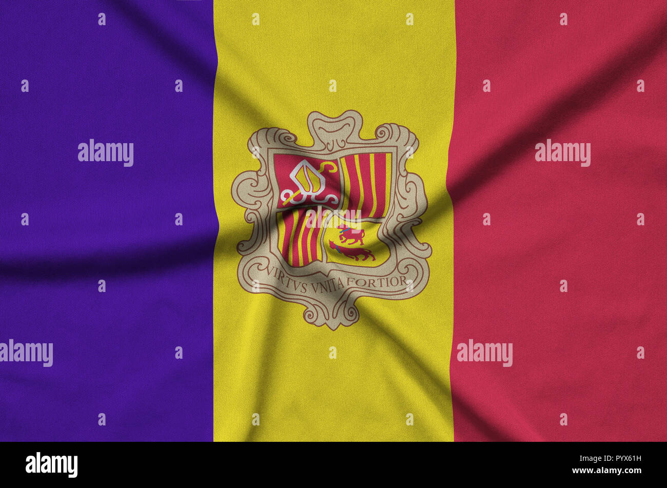 Andorra flag is depicted on a sports cloth fabric with many folds ...