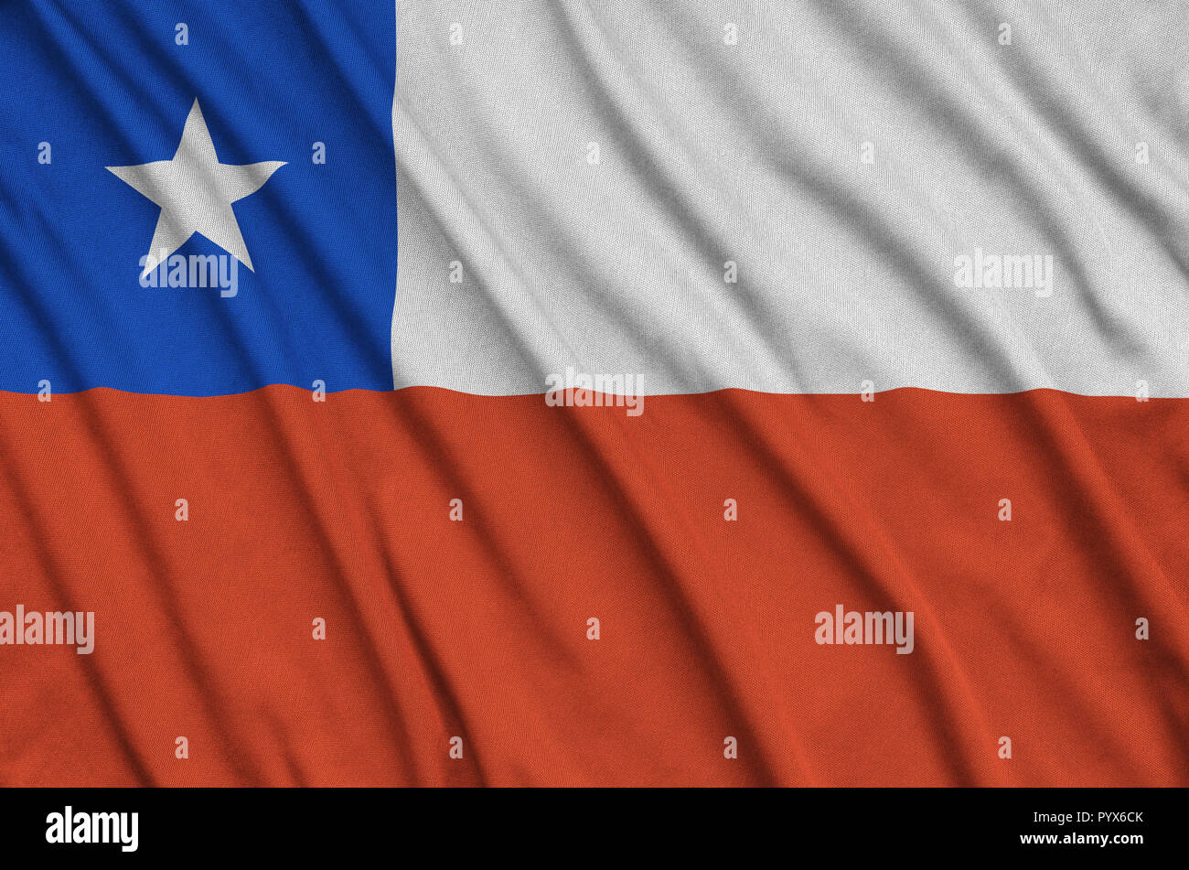 Chile flag is depicted on a sports cloth fabric with many folds. Sport ...