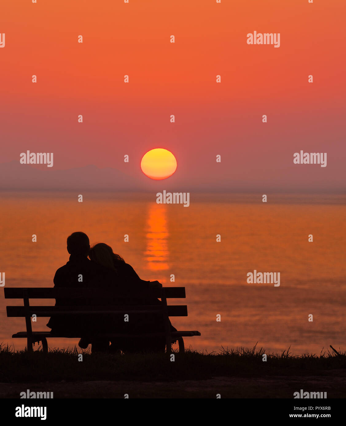 Silhouette of man and woman, Couples hugging, Sunset in autumn Stock ...
