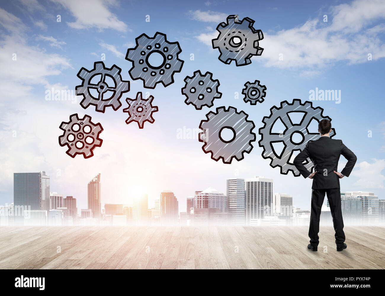 Cogwheel engine drawn on screen as symbol for teamwork and cooperation ...
