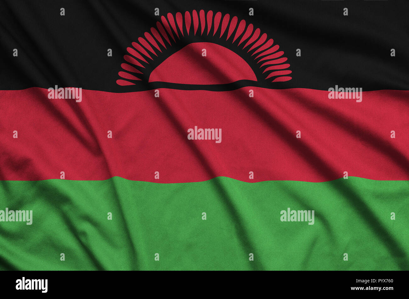 Malawi flag is depicted on a sports cloth fabric with many folds. Sport ...