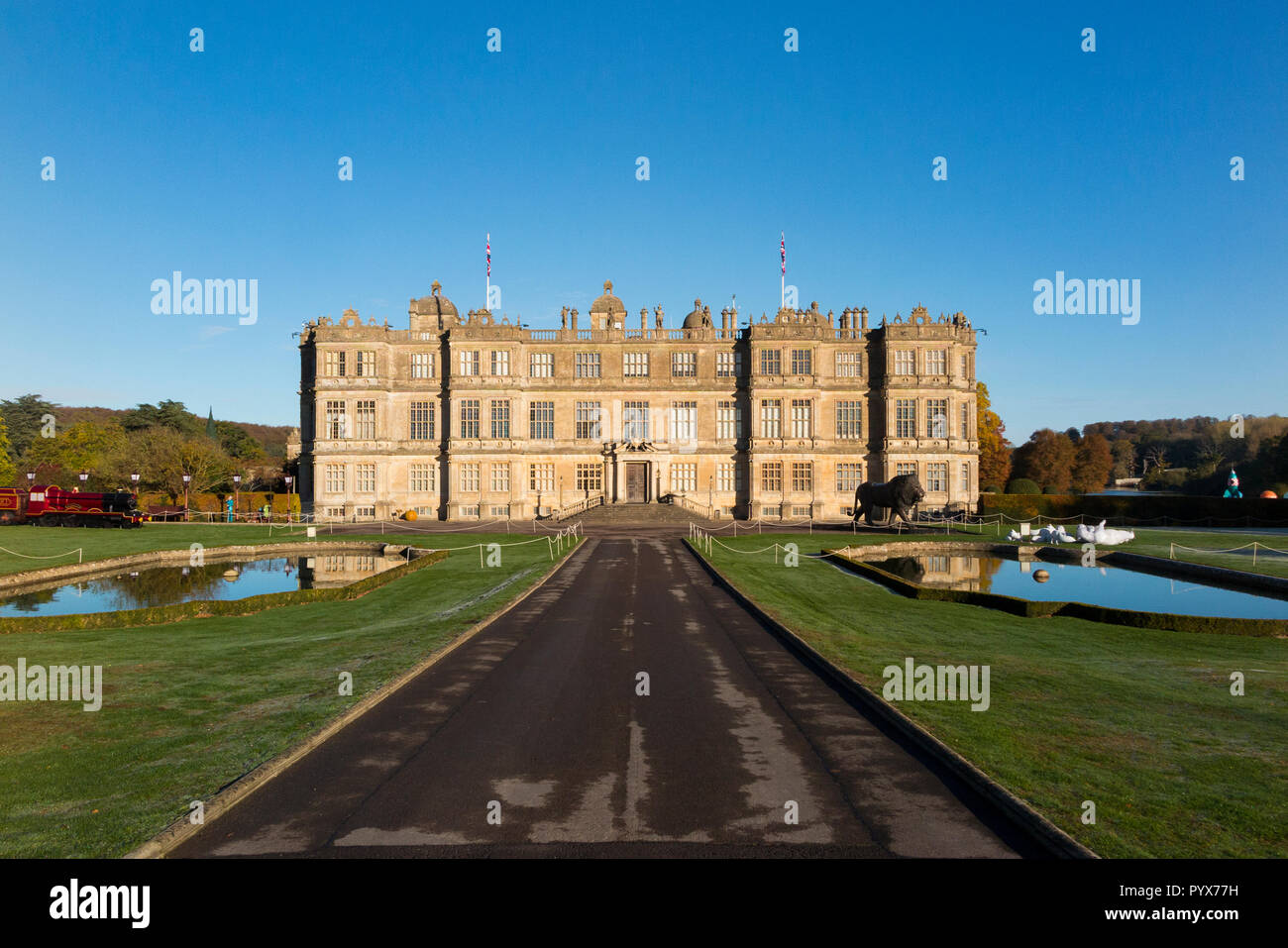 Exterior outside view of the front facade along the drive of Longleat ...