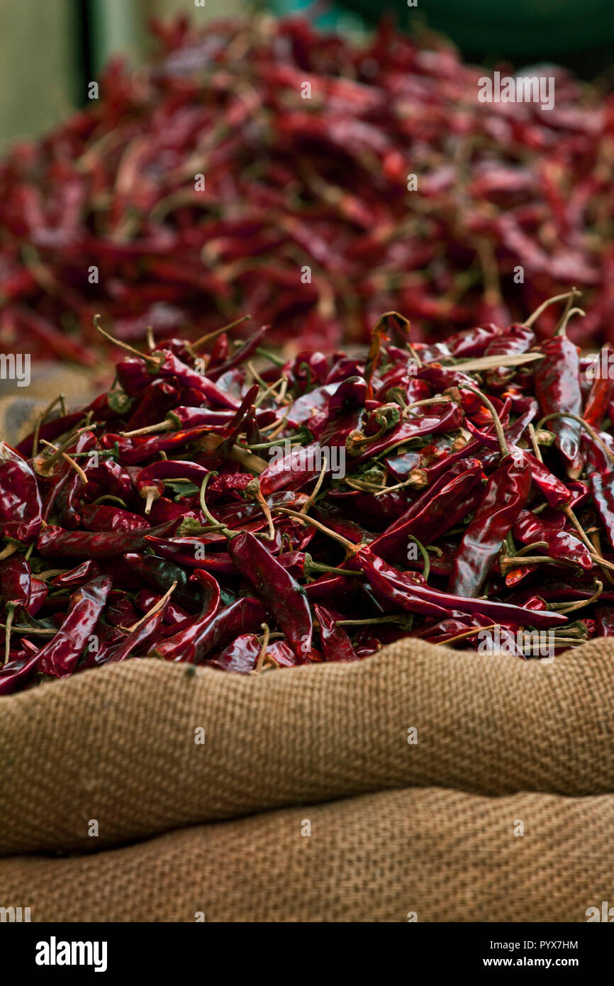 Dried chilli in a sack Stock Photo - Alamy