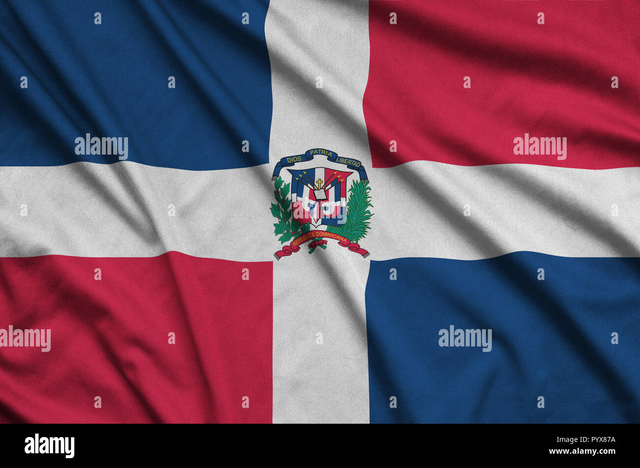 Dominican Republic flag is depicted on a sports cloth fabric with many ...
