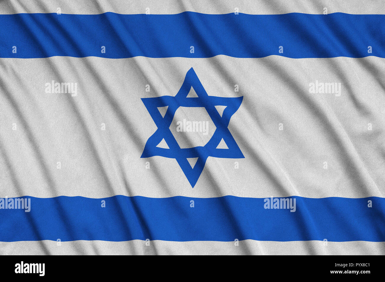Israel flag is depicted on a sports cloth fabric with many folds. Sport ...