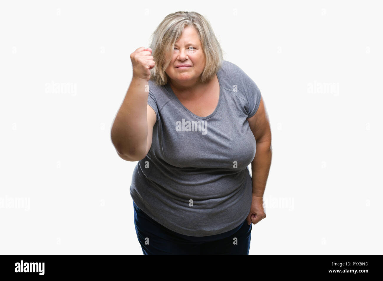 Senior plus size caucasian woman over isolated background angry and mad ...