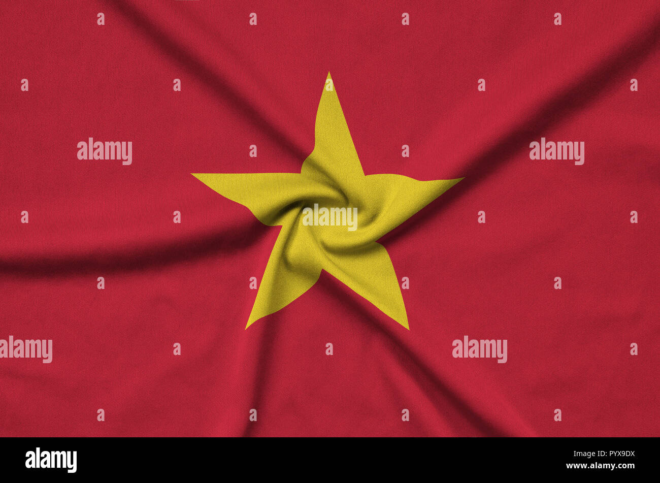 Vietnam flag is depicted on a sports cloth fabric with many folds ...