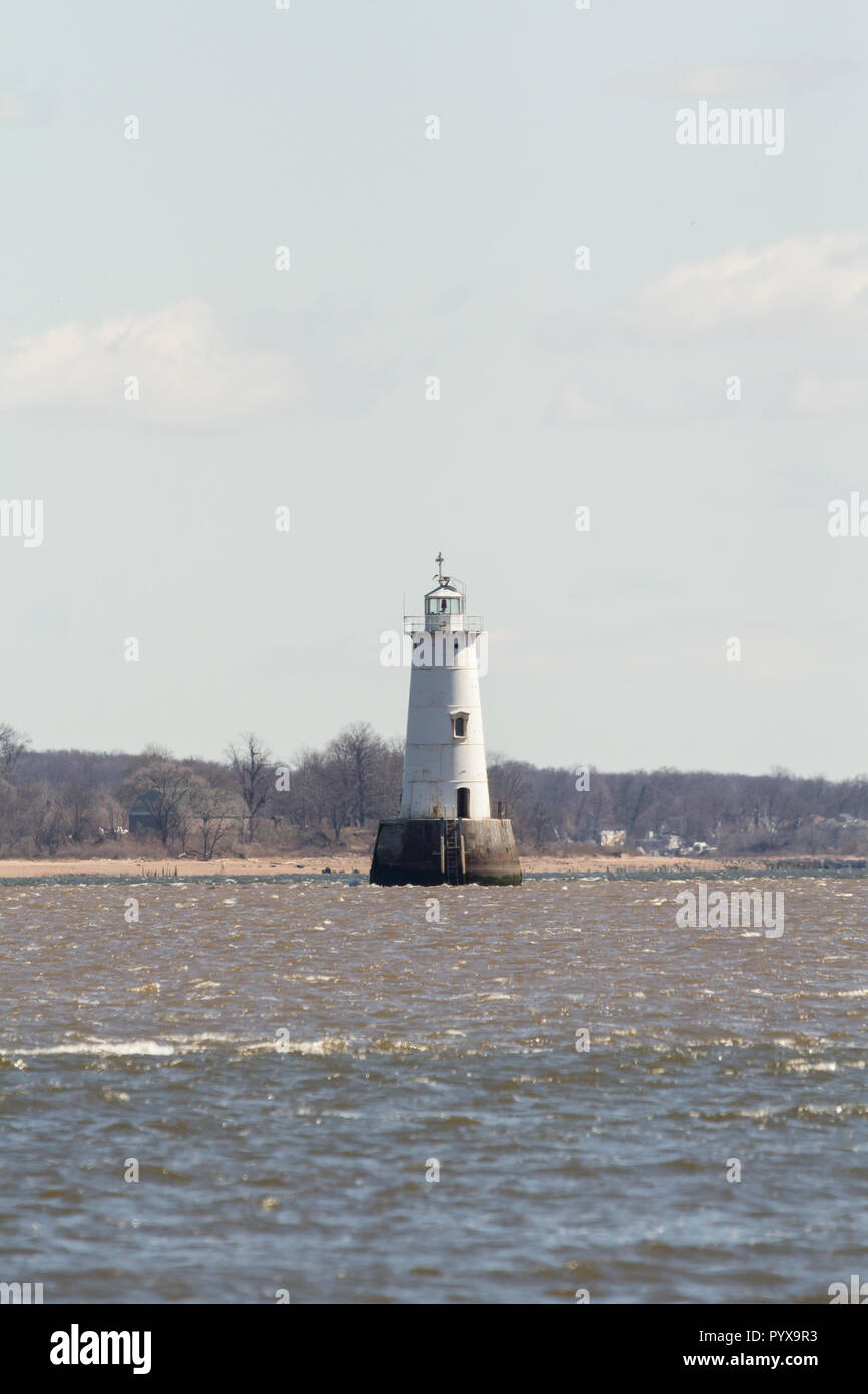 A view of the Great Beds Lighthouse, a spark plug light, in Raritan Bay ...