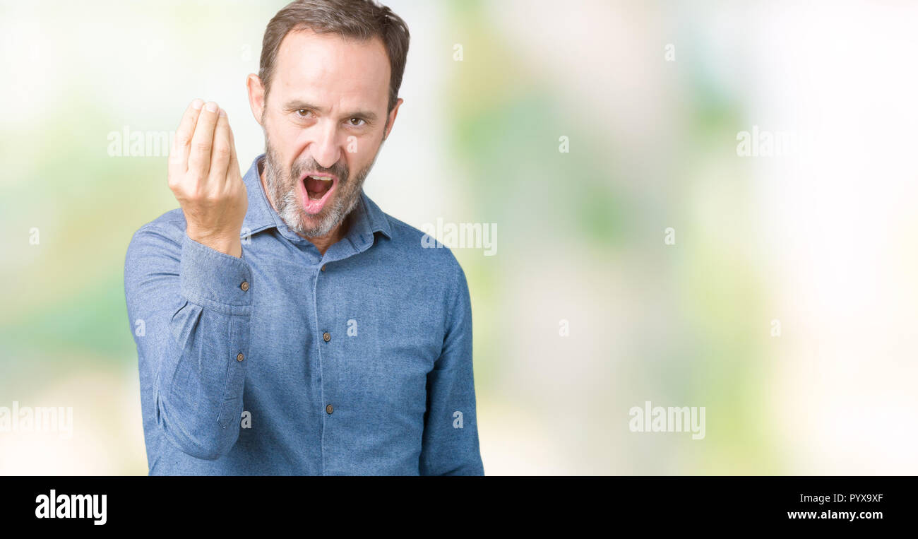 Handsome middle age elegant senior man over isolated background Doing ...