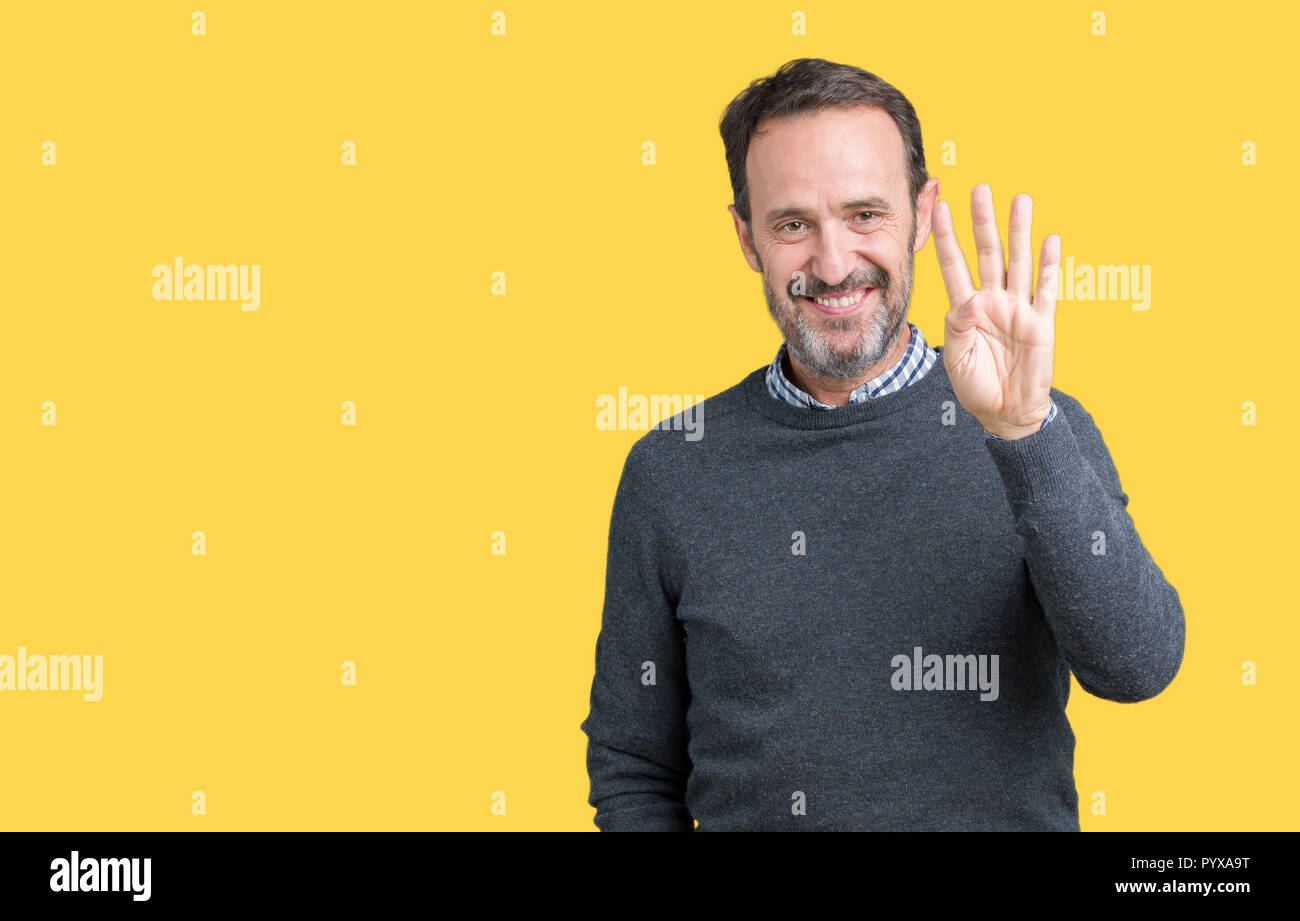 Handsome middle age senior man wearing a sweater over isolated ...