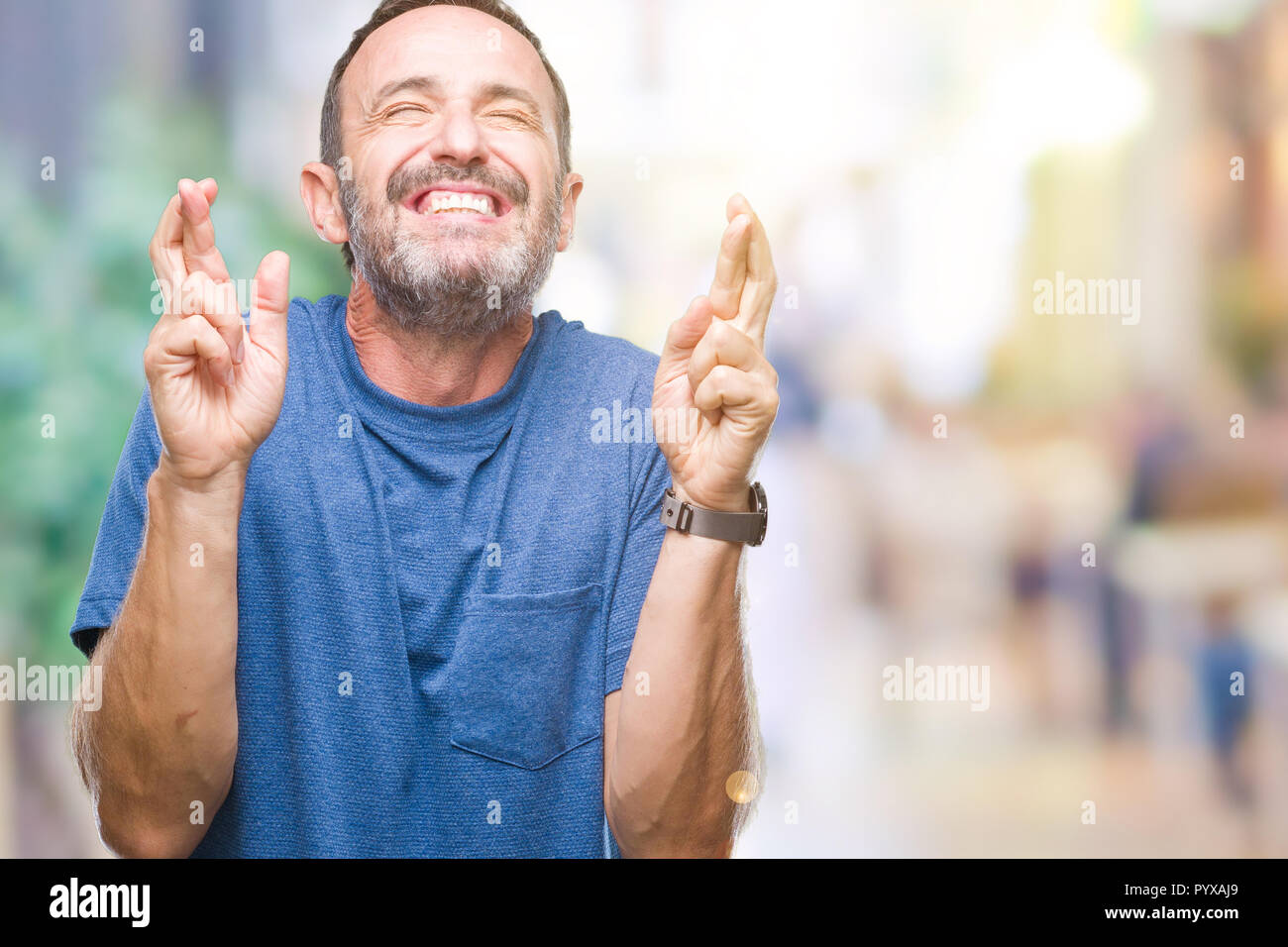 Middle age hoary senior man over isolated background smiling crossing ...