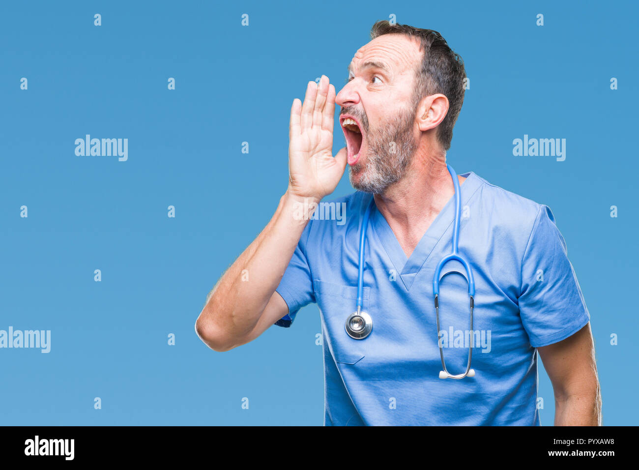 Middle age hoary senior doctor man wearing medical uniform over ...