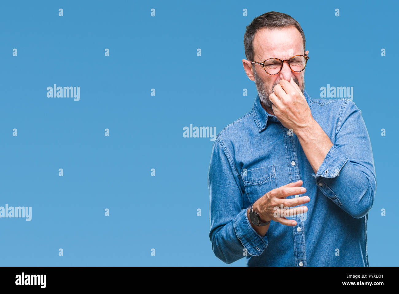 Middle age hoary senior man wearing glasses over isolated background ...